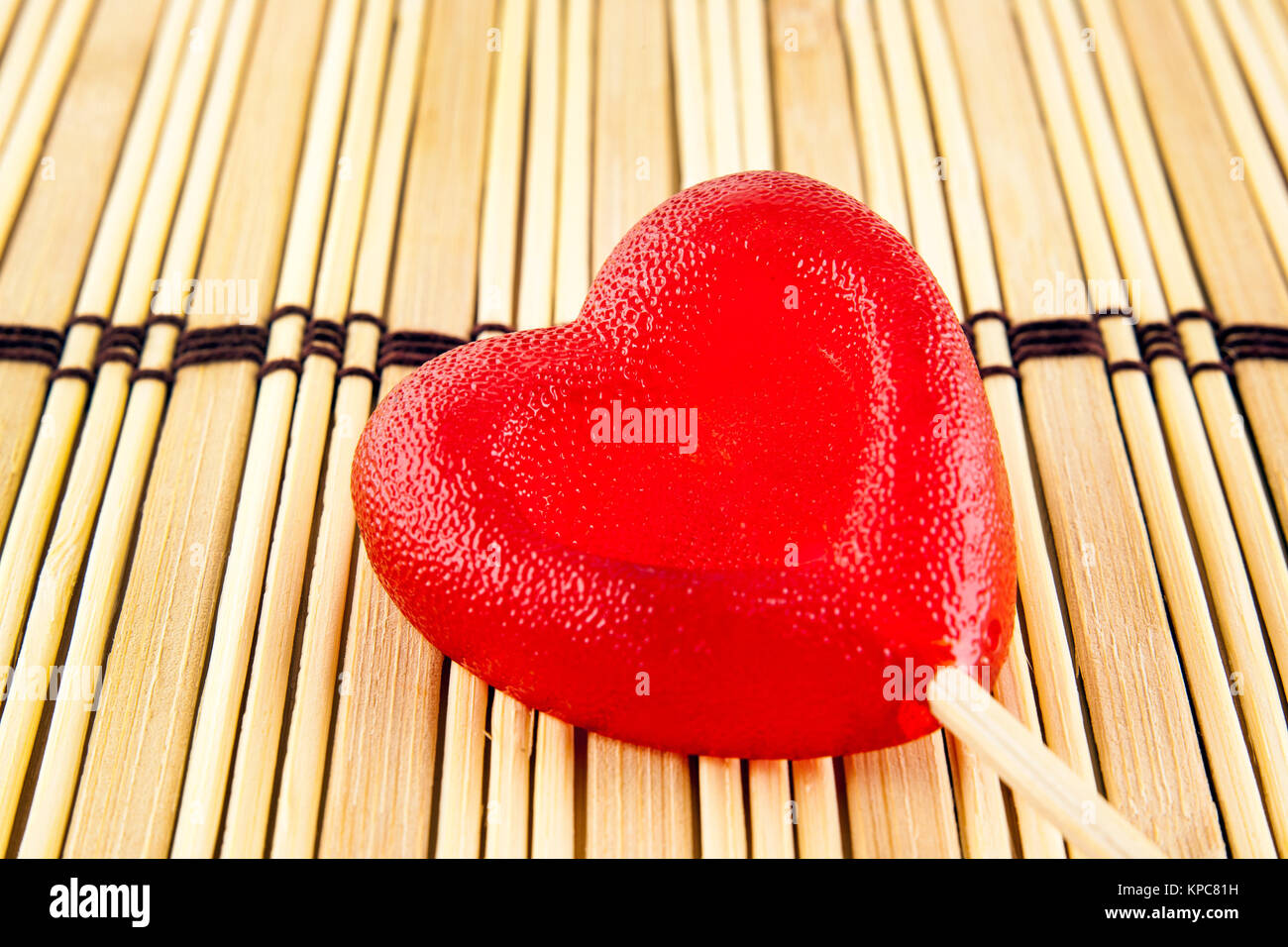Valentine day concept - heart shaped lolly pop on wood background, copy ...