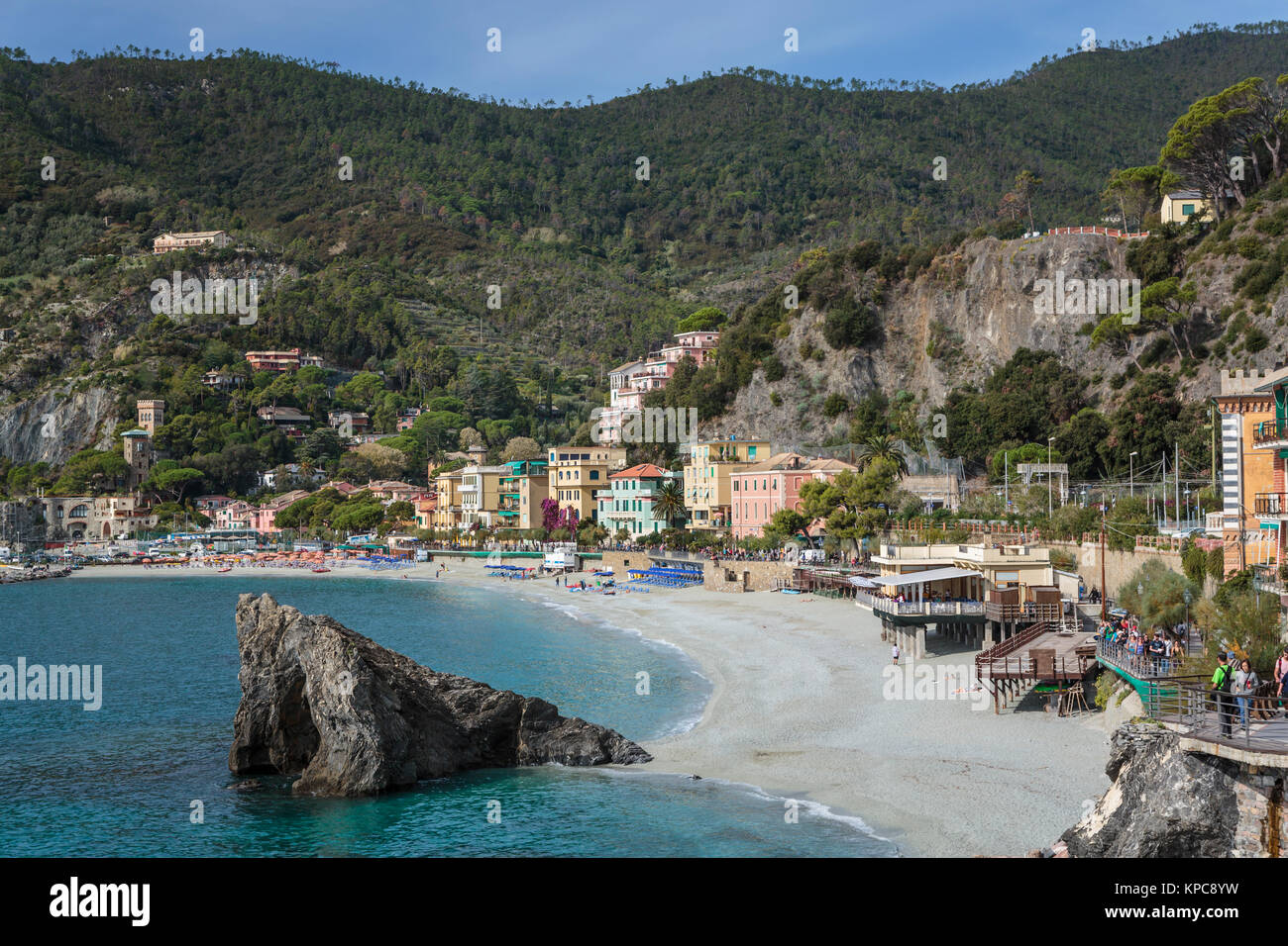 The large rock and sandy beach in Monterosso al Mare, Liguria, Italy ...