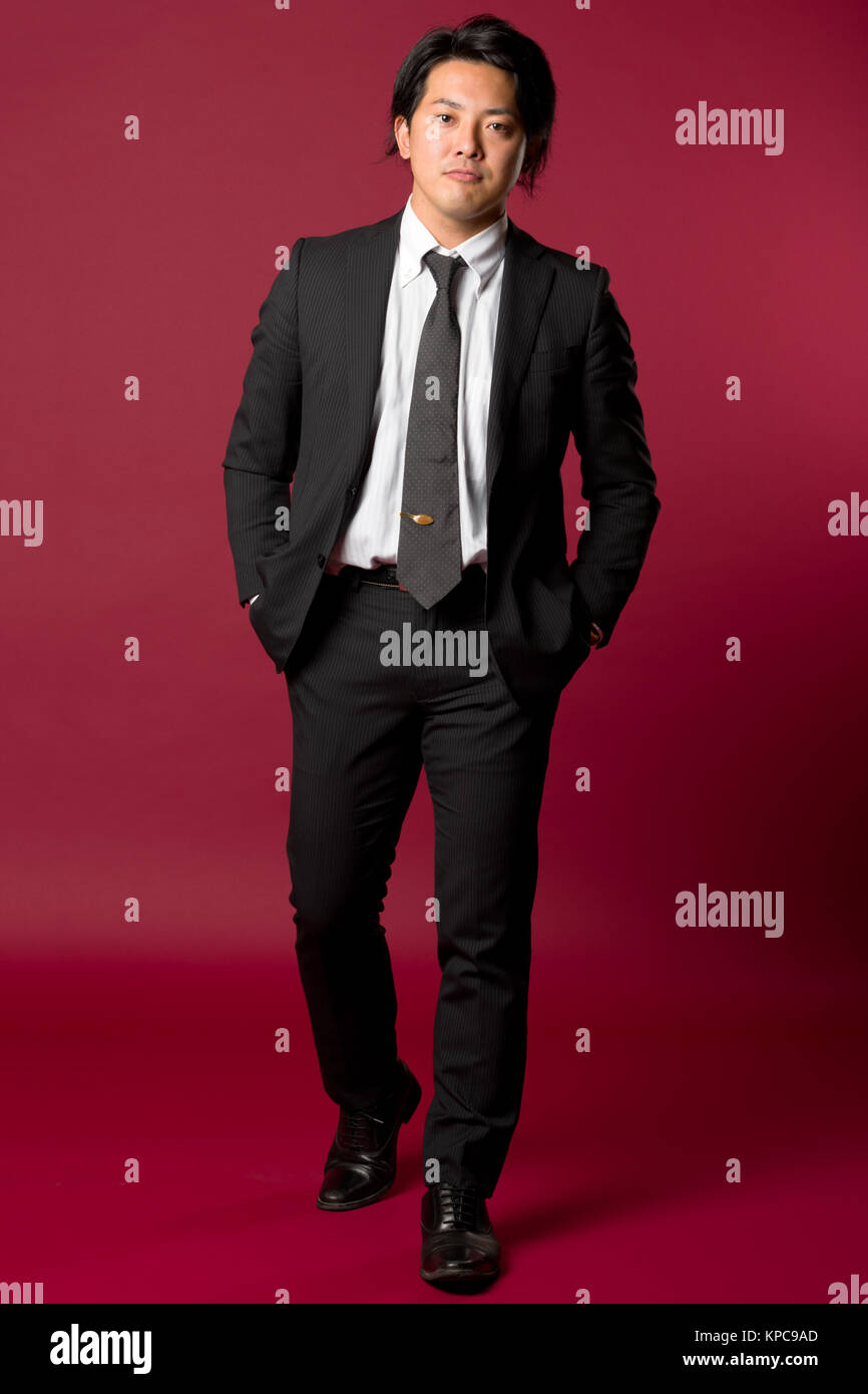 Walking Asian Male Portrait Stock Photo - Alamy