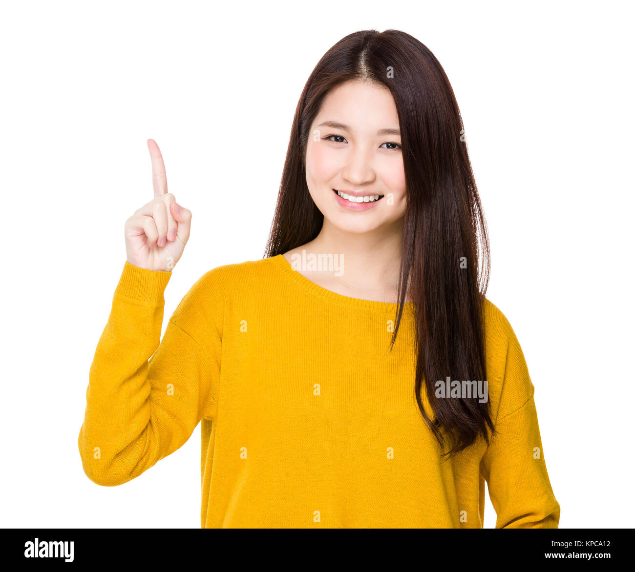 Young woman showing finger up Stock Photo - Alamy