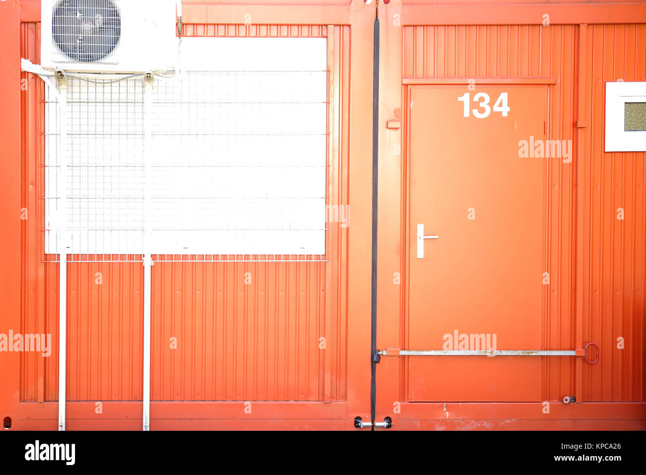 building container with closed door Stock Photo - Alamy