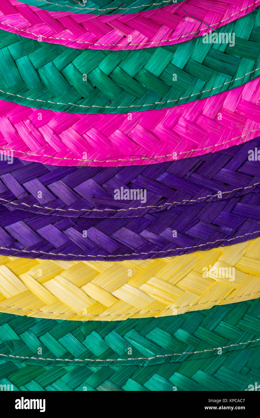 Colorful background of woven straw Stock Photo - Alamy