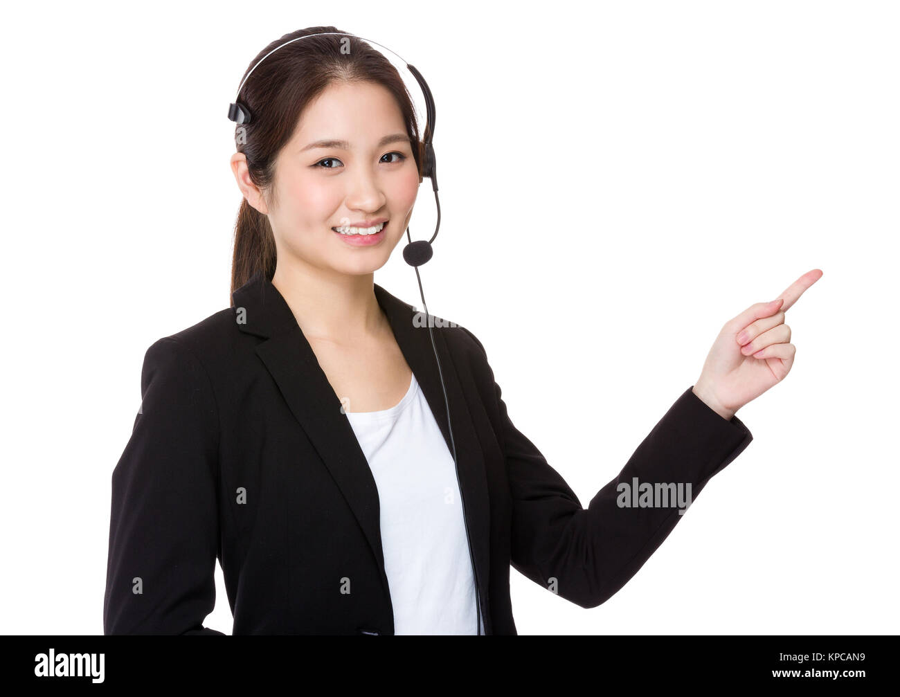 Customer services assistant with finger point up Stock Photo - Alamy