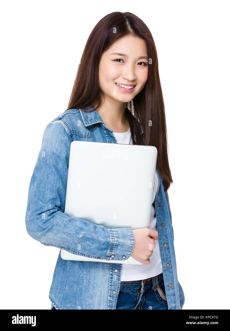 Asian Woman hold with laptop computer Stock Photo - Alamy