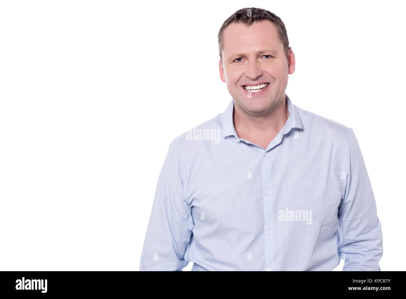 Cheerful man over white Stock Photo - Alamy