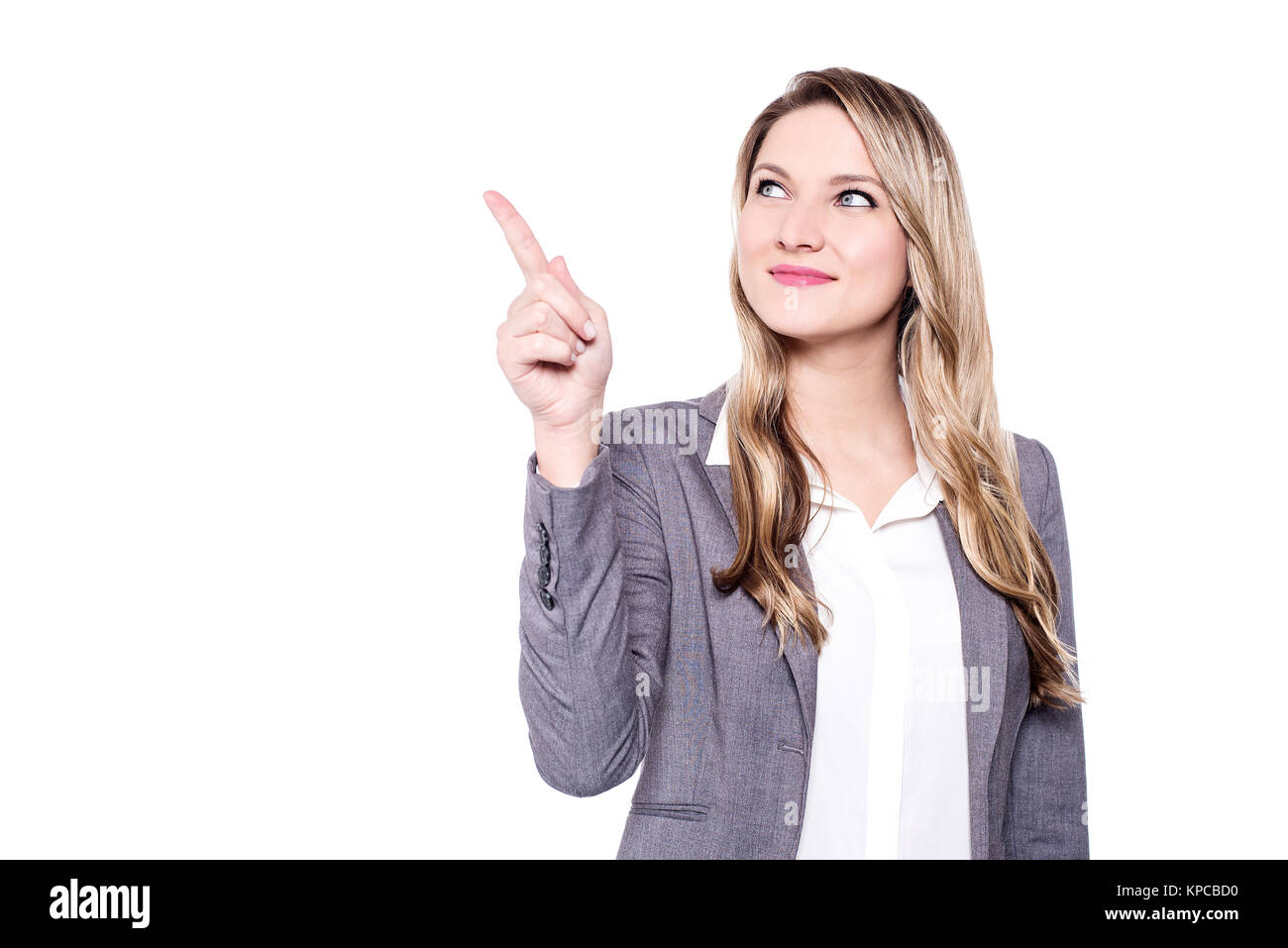 Young girl pointing towards a direction Stock Photo - Alamy