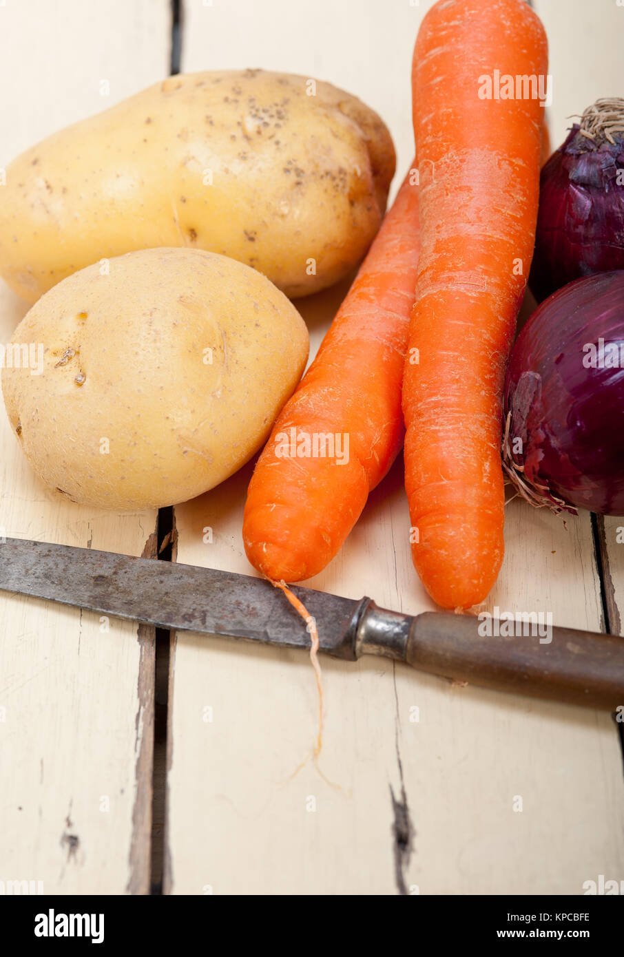 basic vegetable ingredients carrot potato onion Stock Photo - Alamy