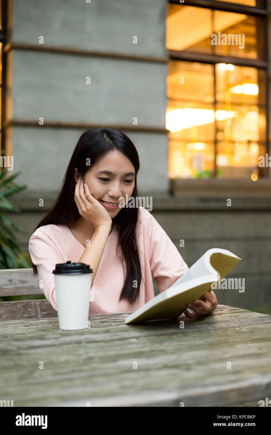 Young Woman enjoy reading book Stock Photo - Alamy