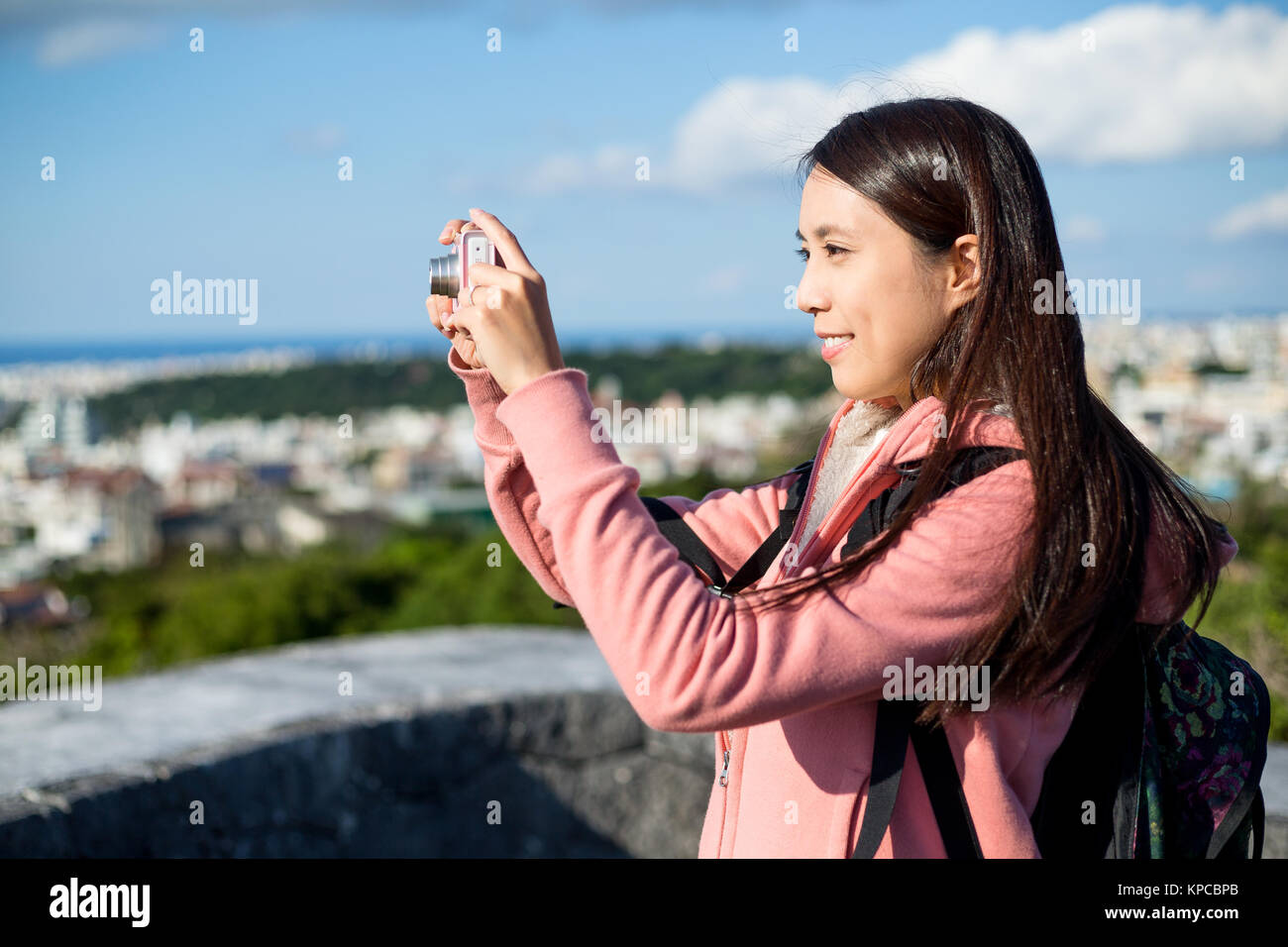 Woman take picture by digital camera Stock Photo - Alamy