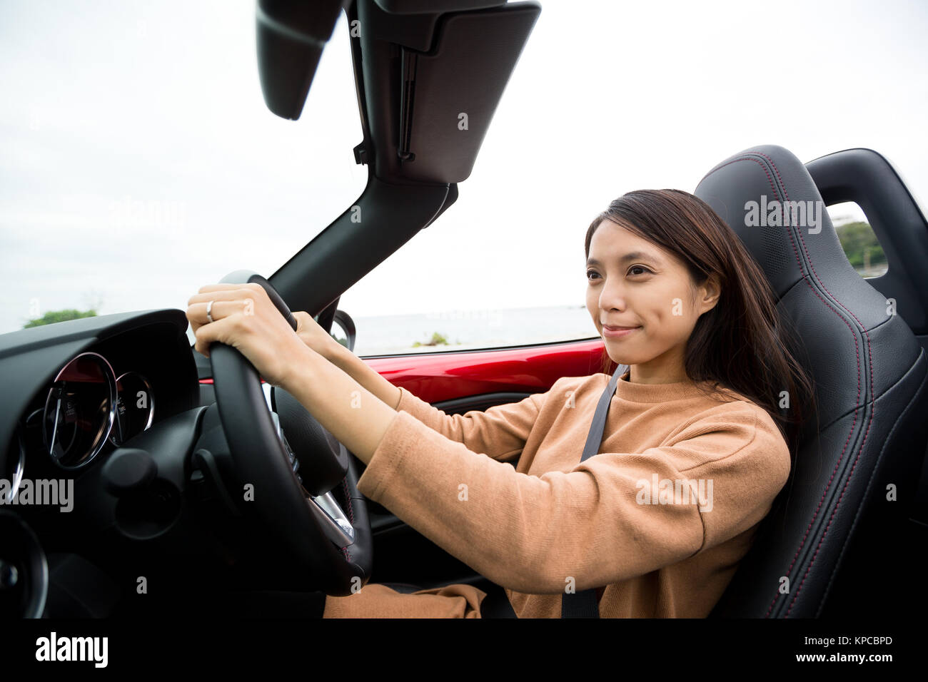 Girls driving convertible hi-res stock photography and images - Alamy