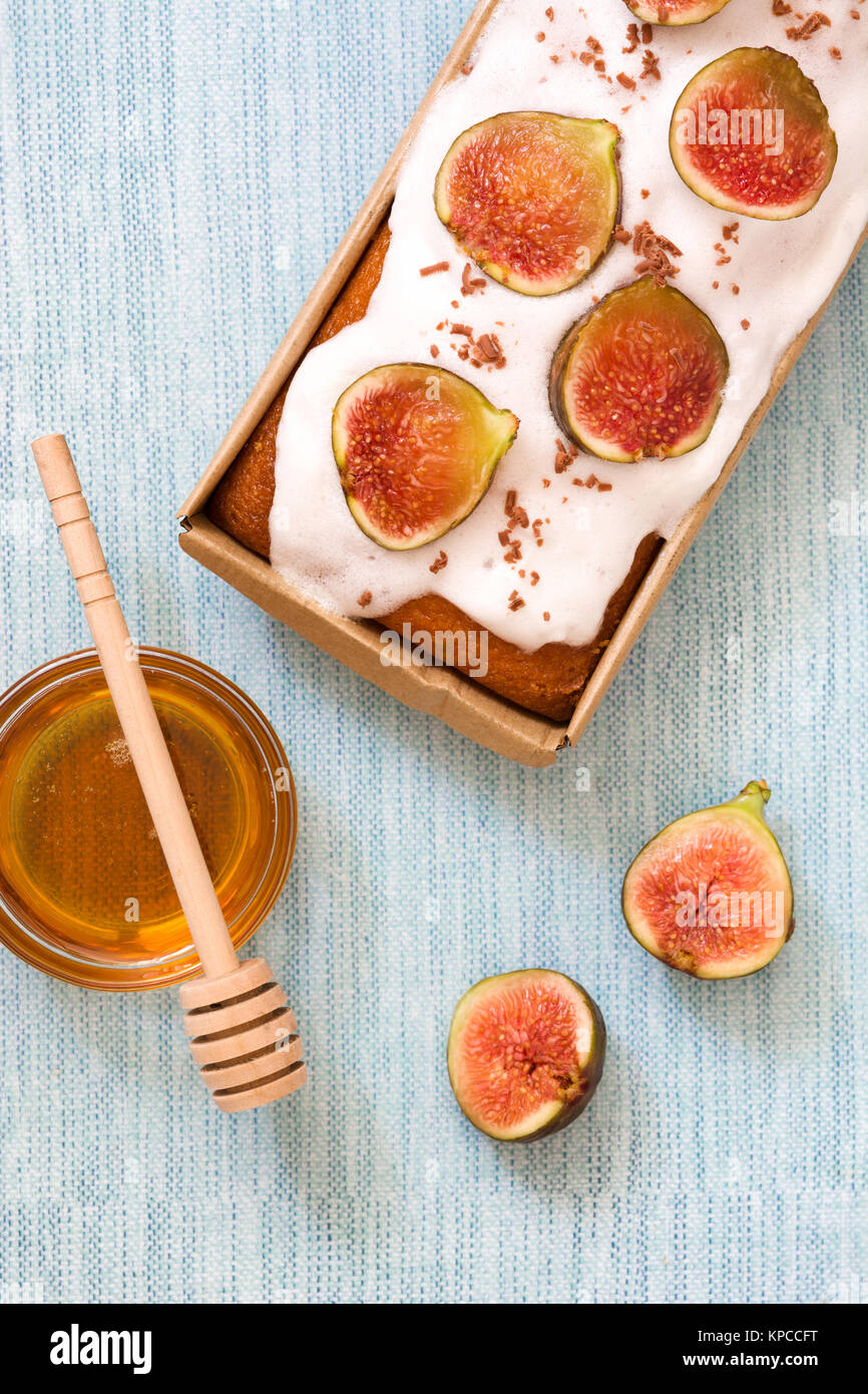 Delicious fig cake on blue background Stock Photo - Alamy