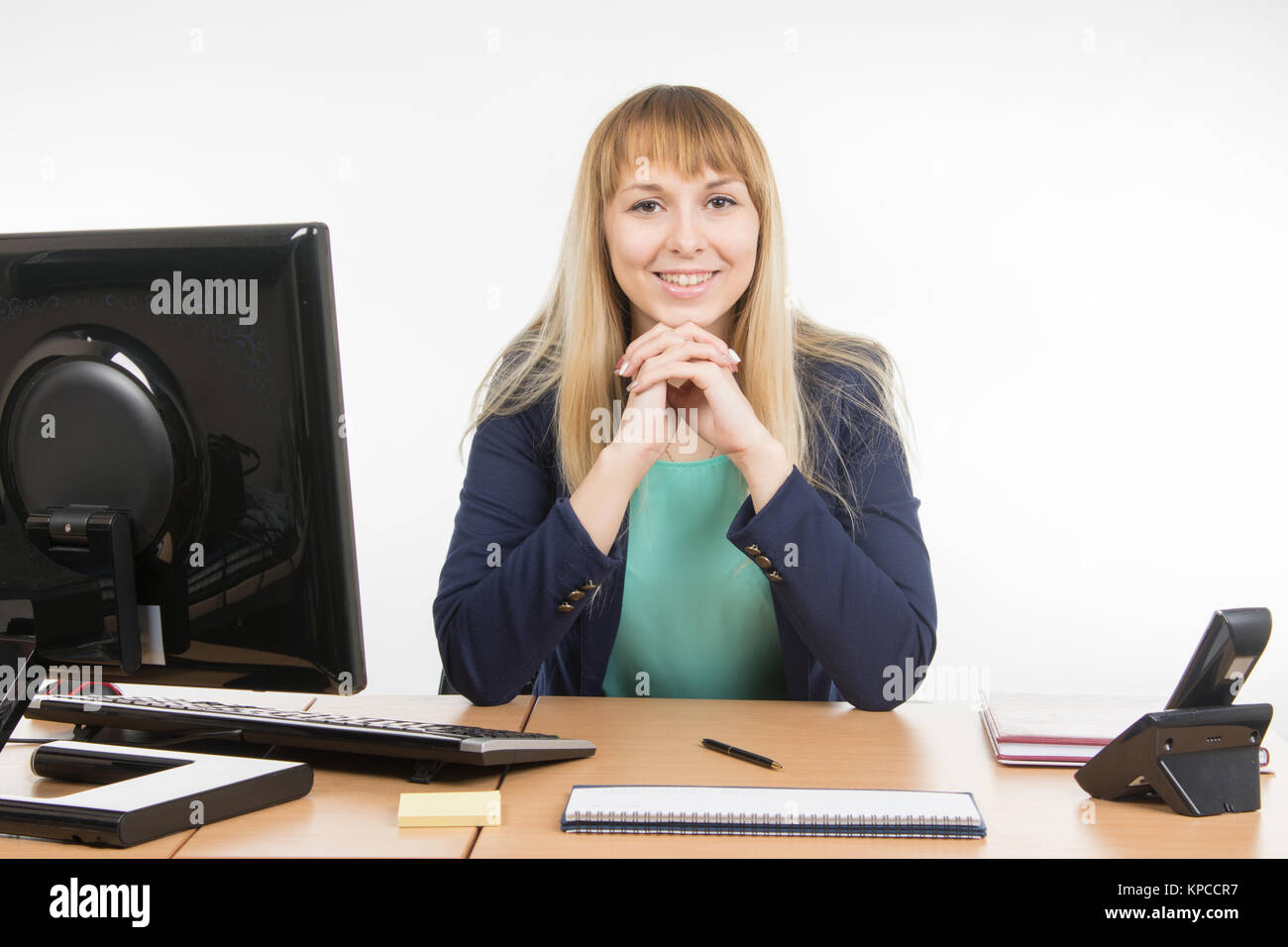 Attractive blonde secretary sitting desk hi-res stock photography and ...