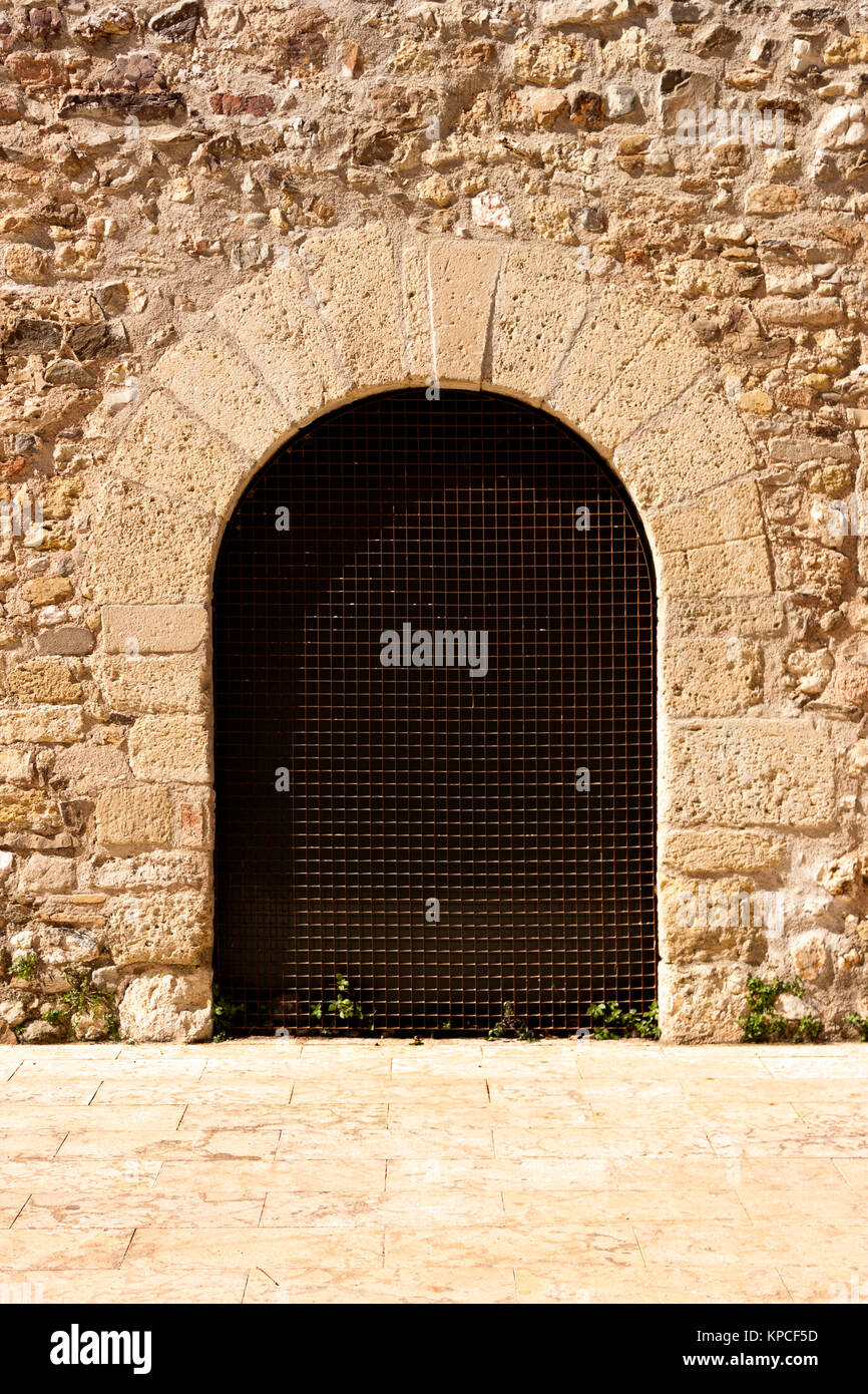 Arch door in the romanesque monastery of Sant Cugat Stock Photo - Alamy
