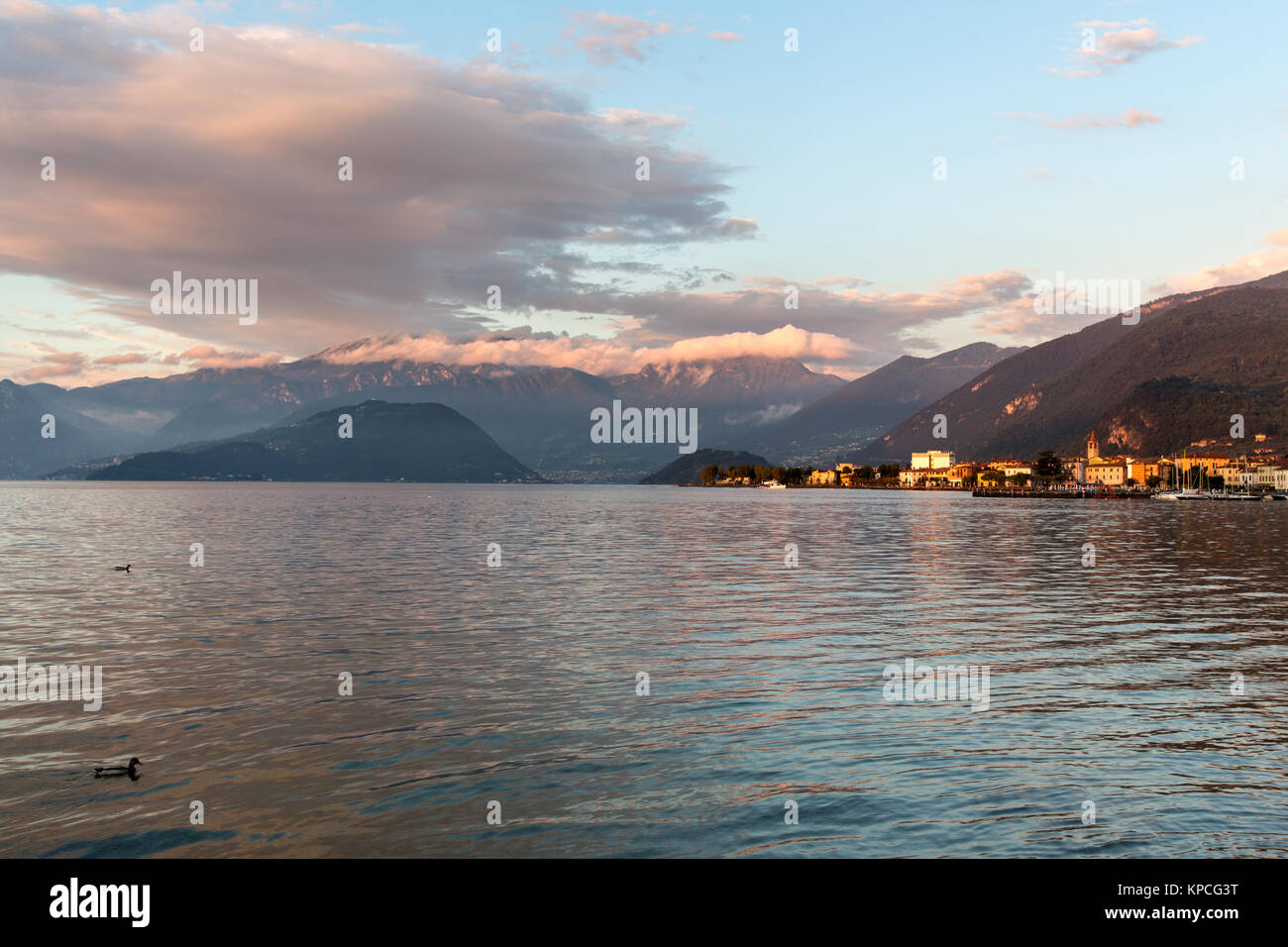 Lake Iseo, Italy. Picturesque dusk view of Lake Iseo, with the town of ...