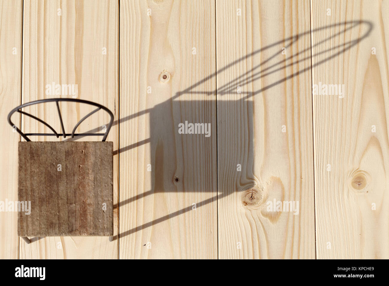 shadow of chair on the wooden floor Stock Photo - Alamy