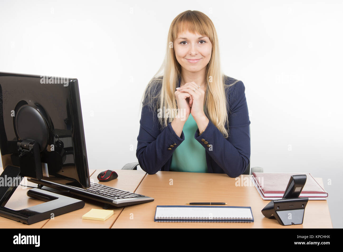 Beautiful business woman at the desk Stock Photo - Alamy