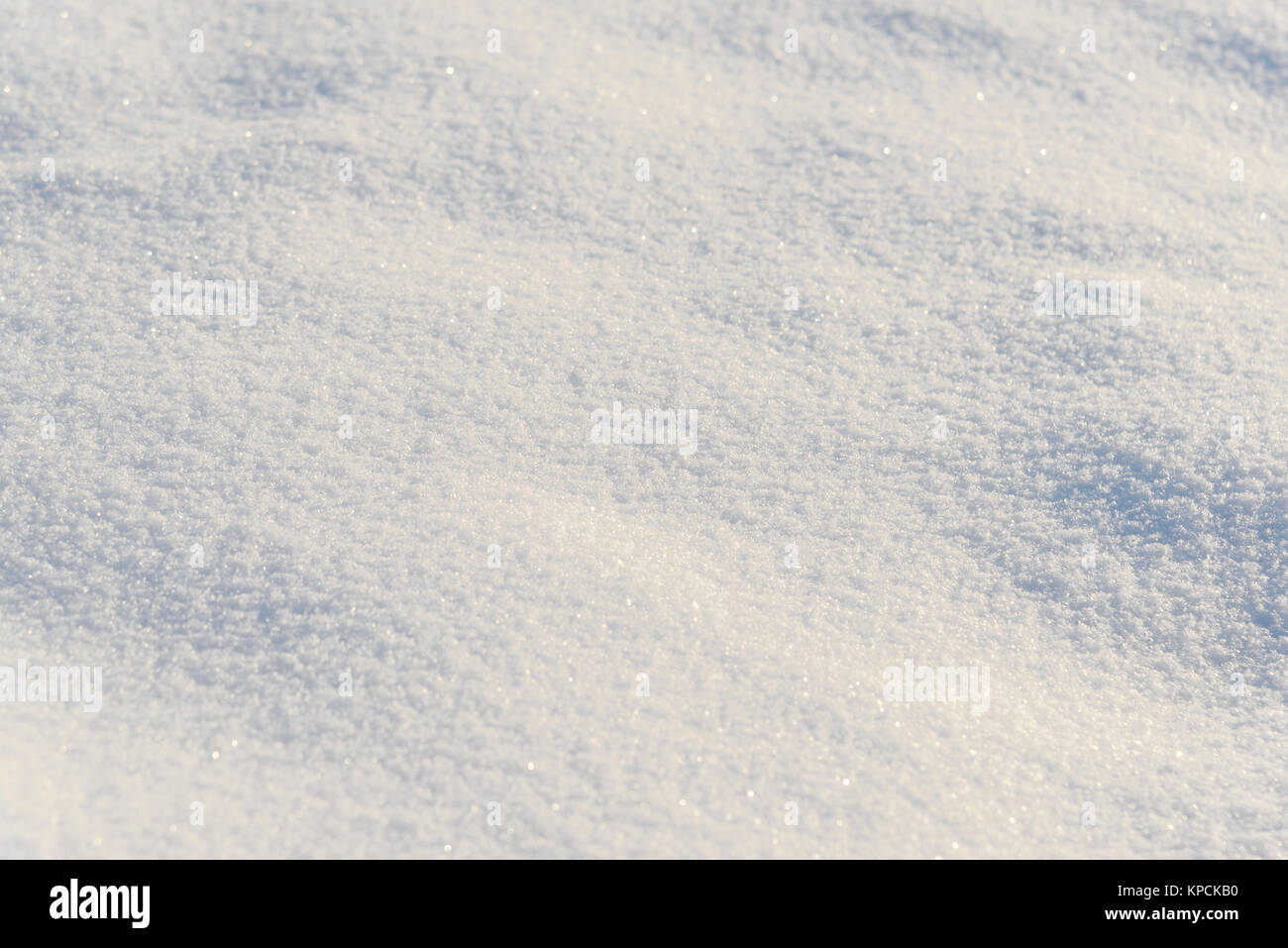 Winter white snow on the sun. background texture Stock Photo - Alamy