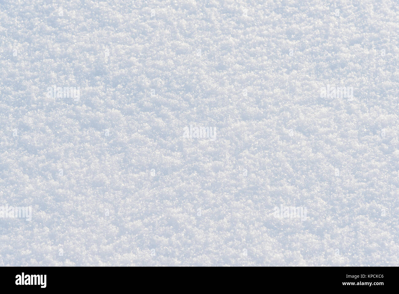 Winter white snow on the sun. background texture Stock Photo - Alamy