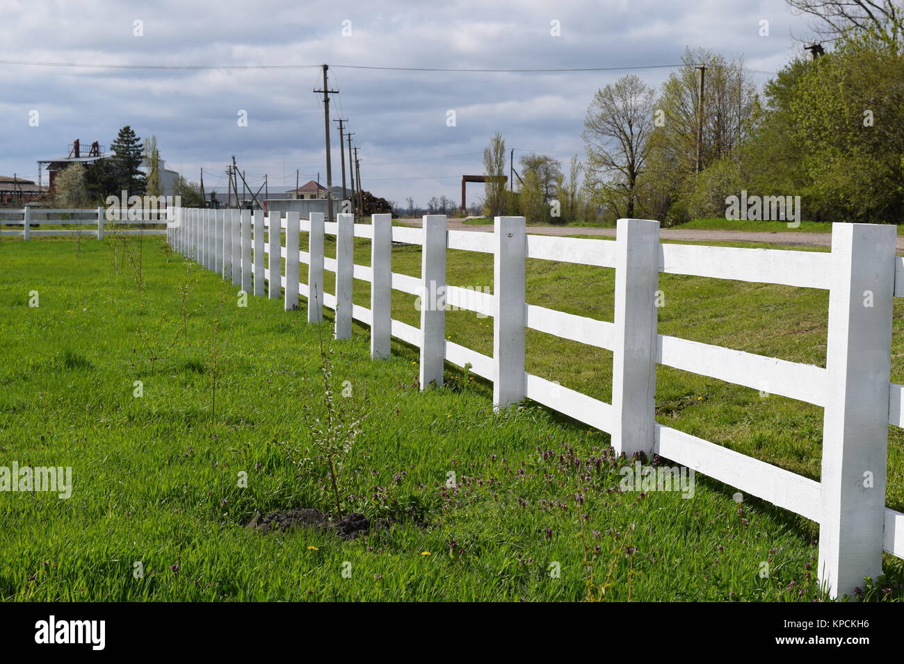 White wooden fence around the ranch Stock Photo - Alamy