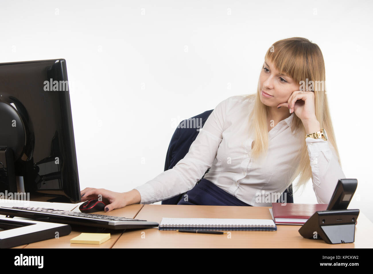 Office a specialist a little tired of working at a computer Stock Photo ...