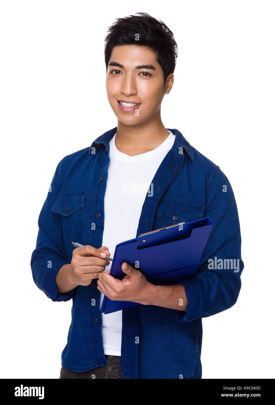 Young man take note on clipboard Stock Photo - Alamy