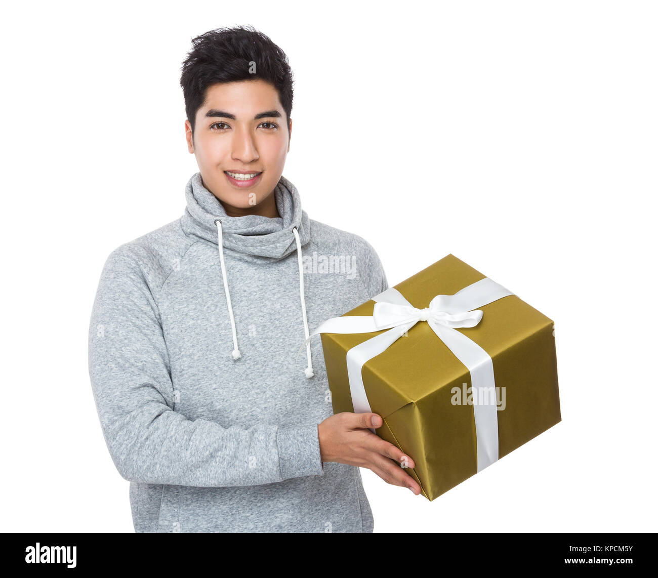 Asian young man holding with big present box Stock Photo - Alamy
