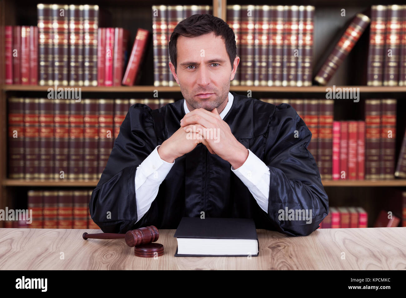 Male judge book table hi-res stock photography and images - Alamy
