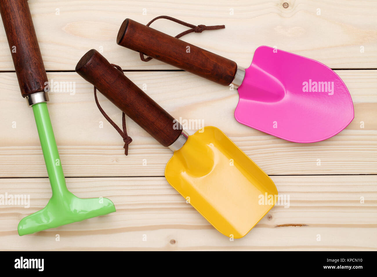 garden tools on wood background Stock Photo - Alamy