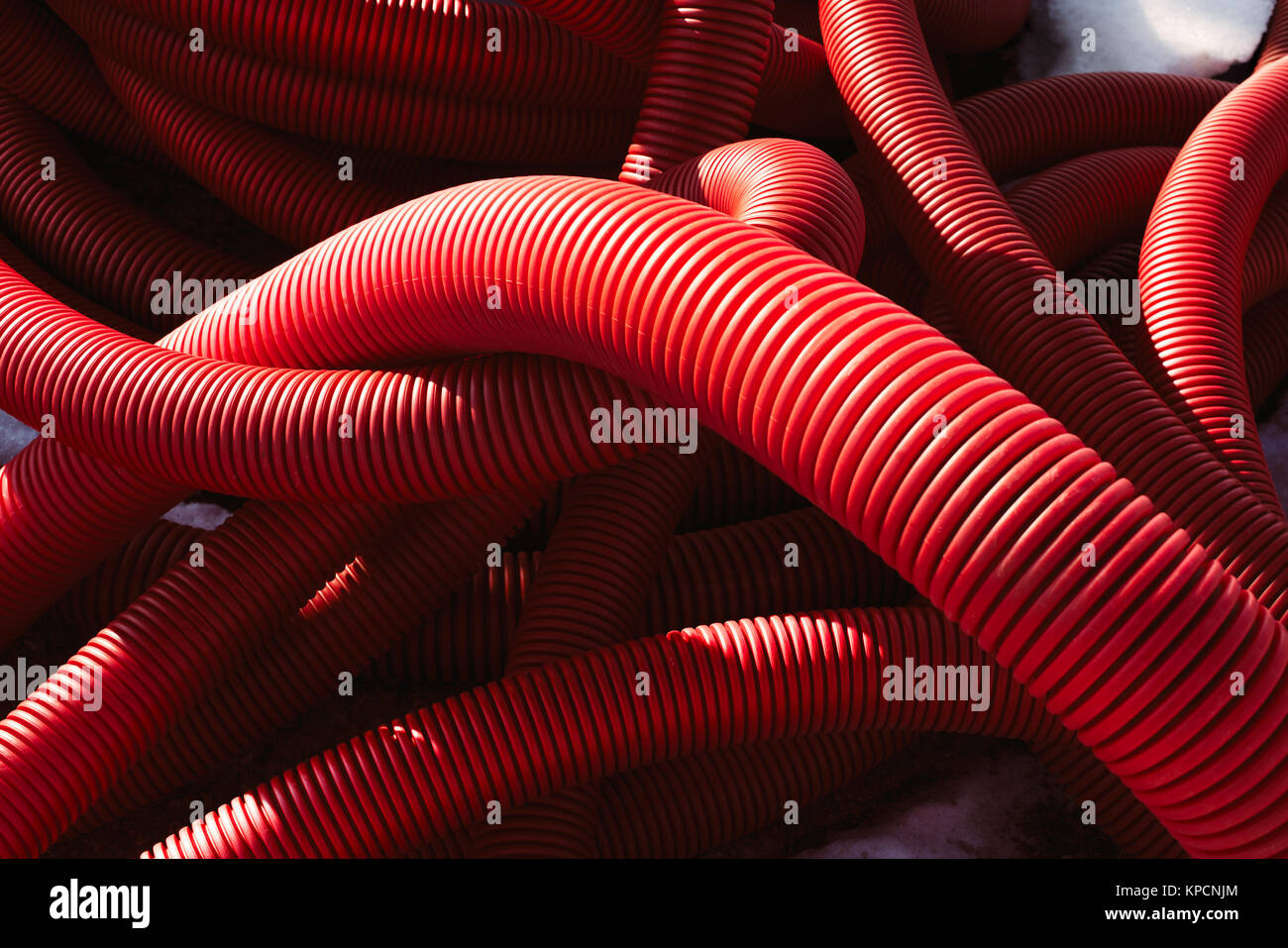 red corrugated pipes BACKGROUND Stock Photo - Alamy