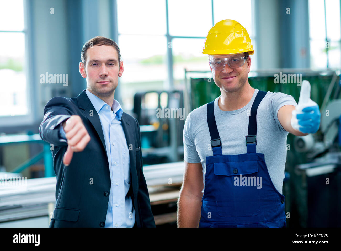 collective bargaining- boss and worker with thumbs up and down Stock ...