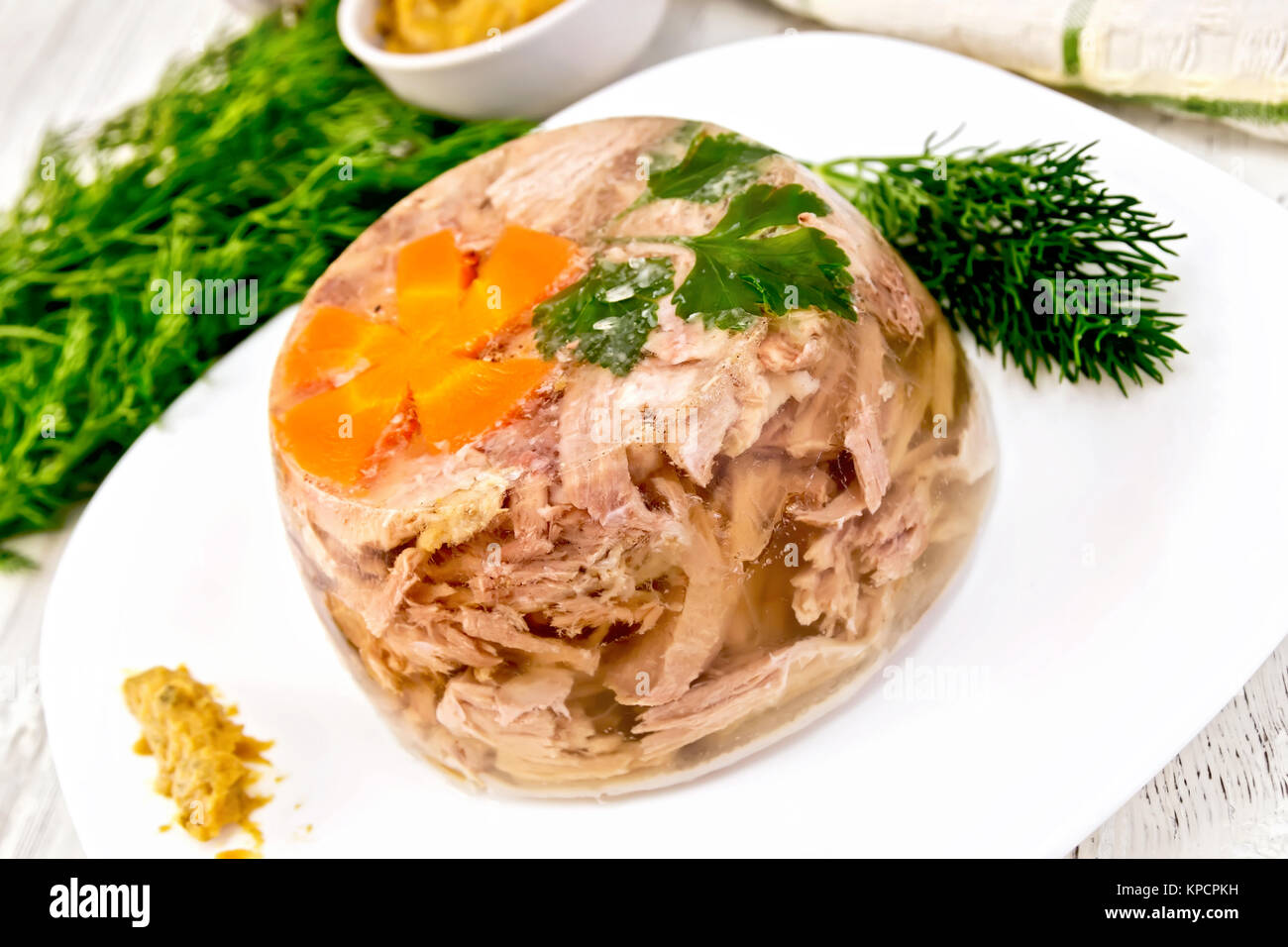 Jellied in plate on board Stock Photo - Alamy