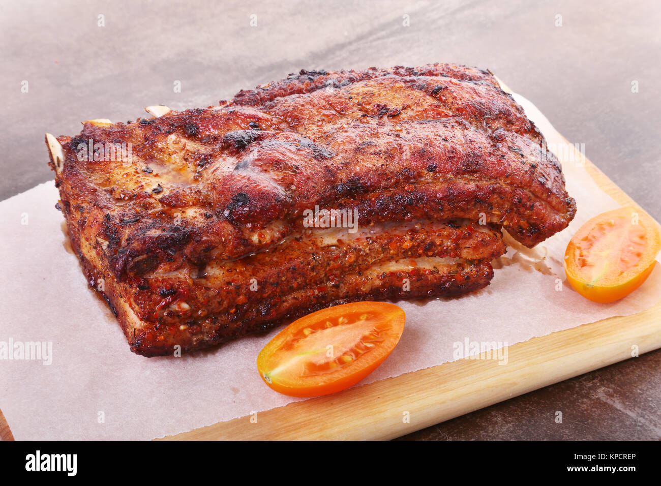 grilled pork chops with tomato and ketchup on plate Stock Photo - Alamy