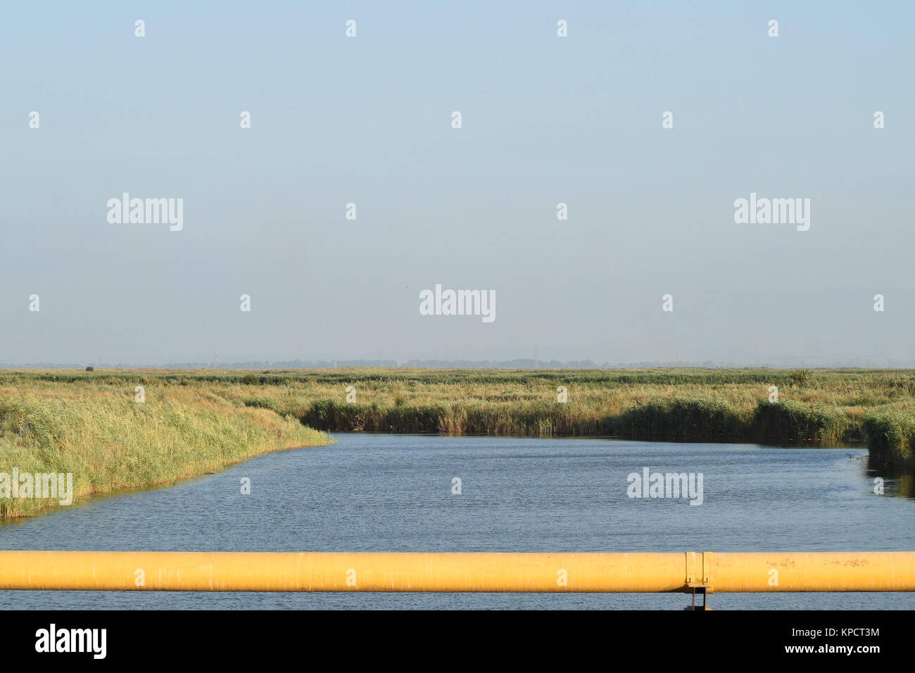 The gas pipeline through the small river Stock Photo - Alamy