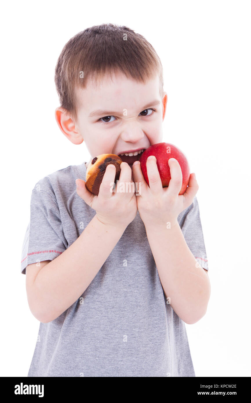 little boy with food isolated on white background - apple or a muffin ...
