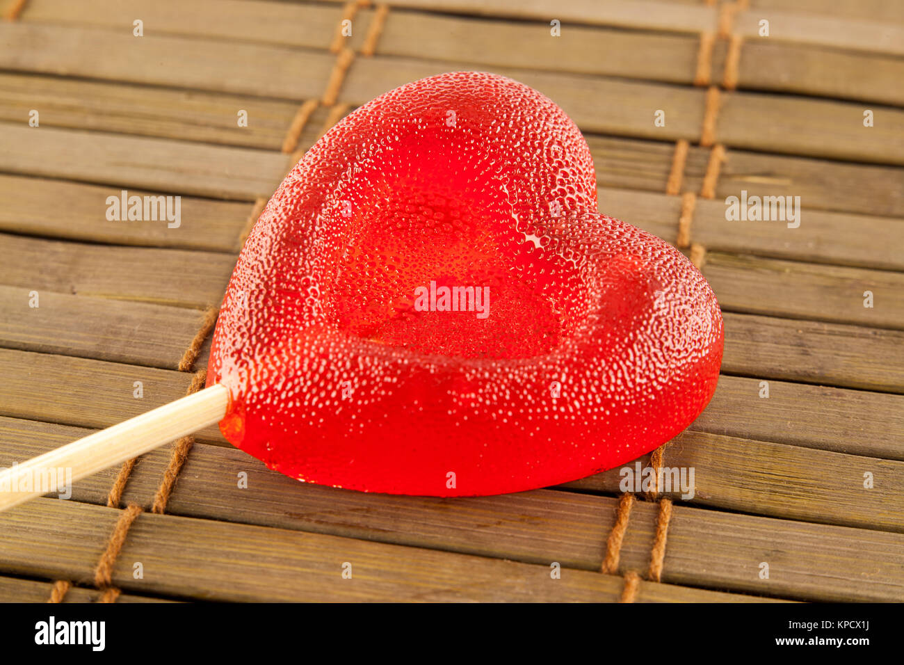 Valentine day concept - heart shaped lolly pop on wood background Stock ...