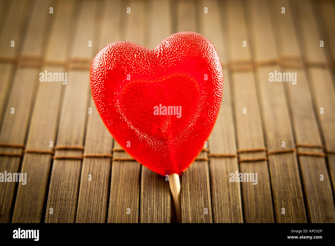 Valentine day concept - heart shaped lolly pop on wood background Stock ...