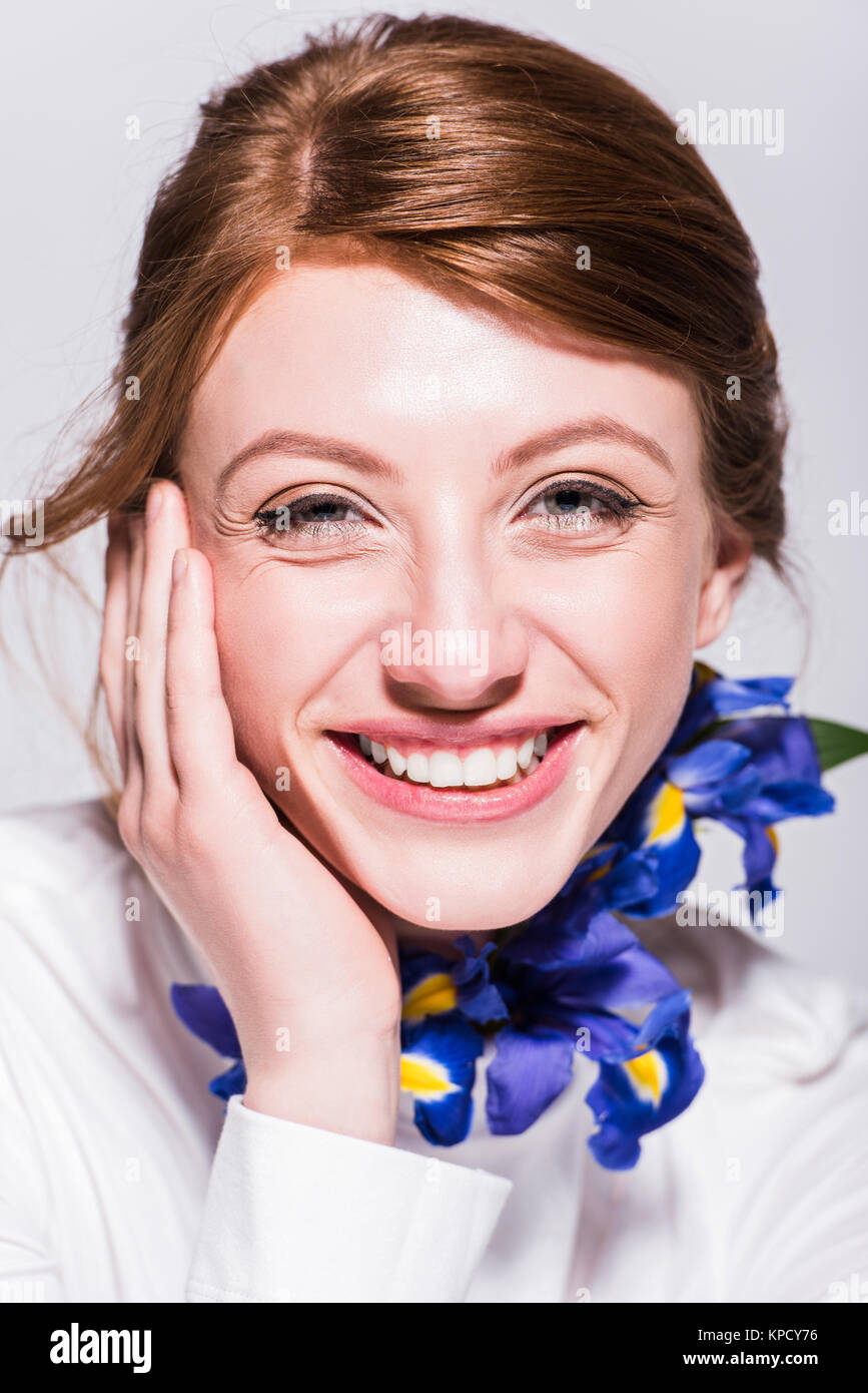 beautiful woman with iris flowers Stock Photo - Alamy