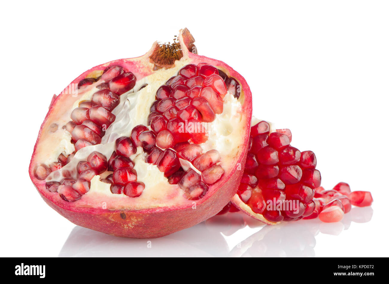 Half pomegranate fruit Stock Photo - Alamy