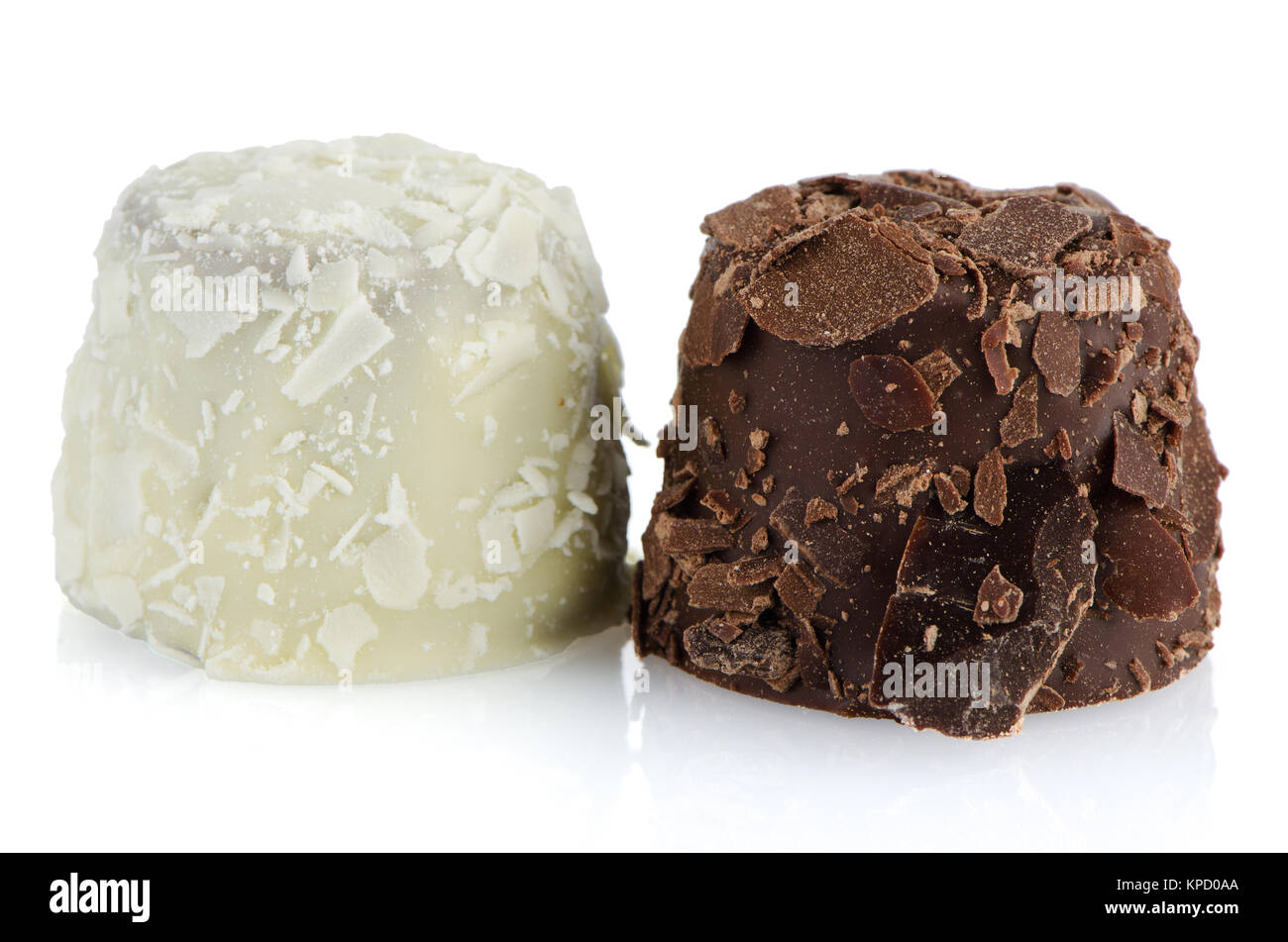 White and brown chocolate candies Stock Photo - Alamy