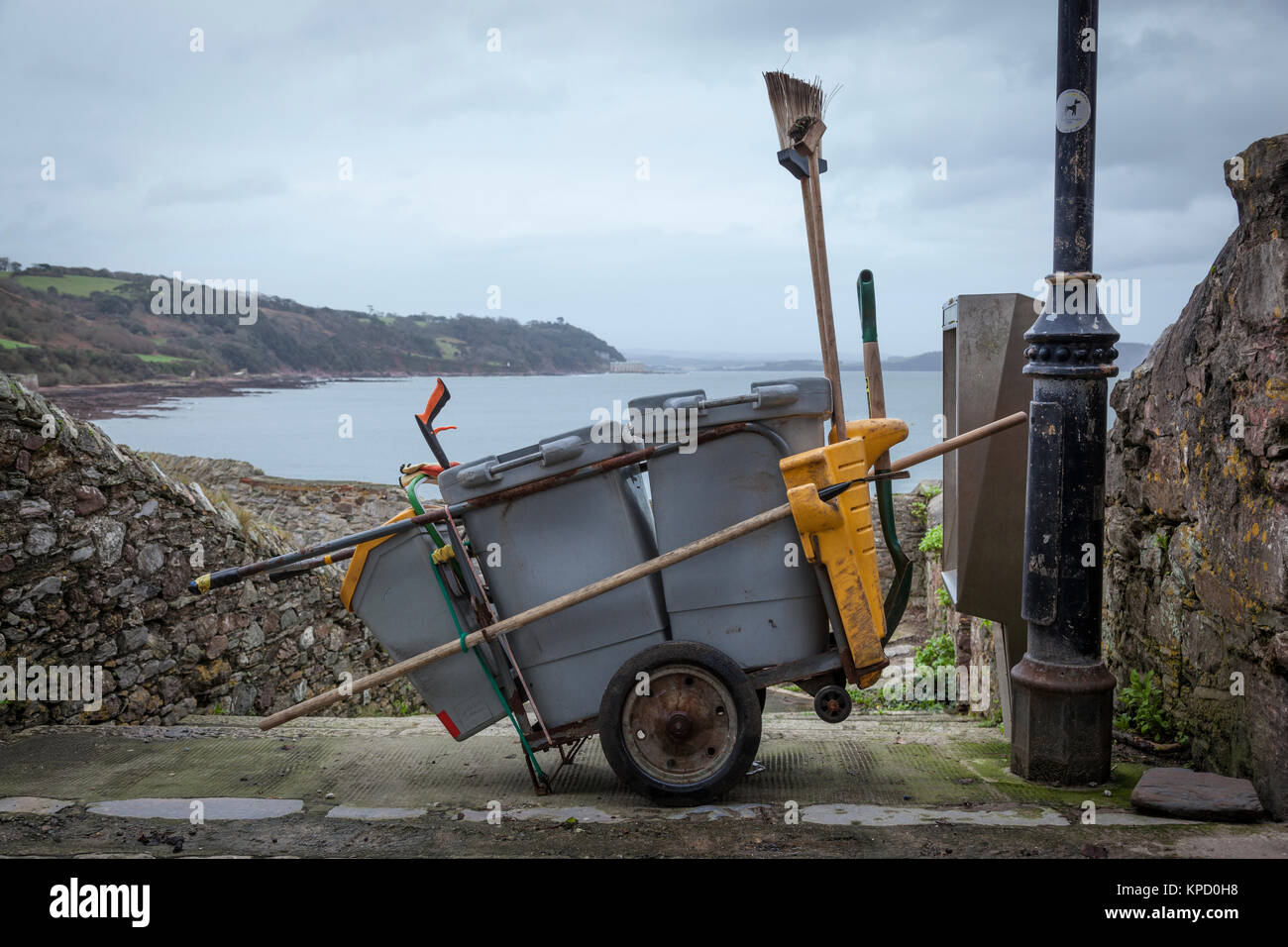 Street cleaner's trolley cart complete with brushes and shovel is ...