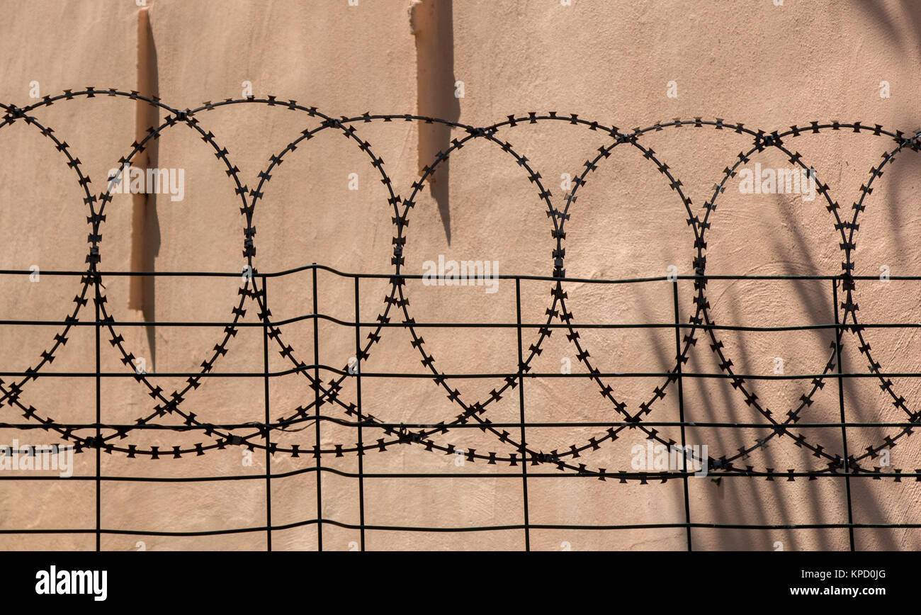 barbed wire fence used for protection purposes Stock Photo - Alamy