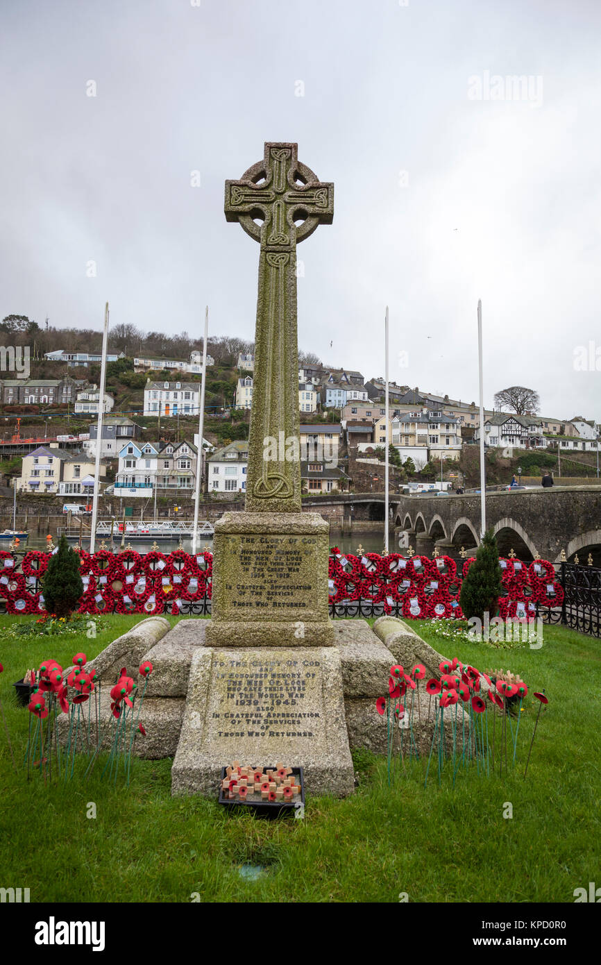 Poppies and poppy wreaths and crosses, feature alongside the War ...