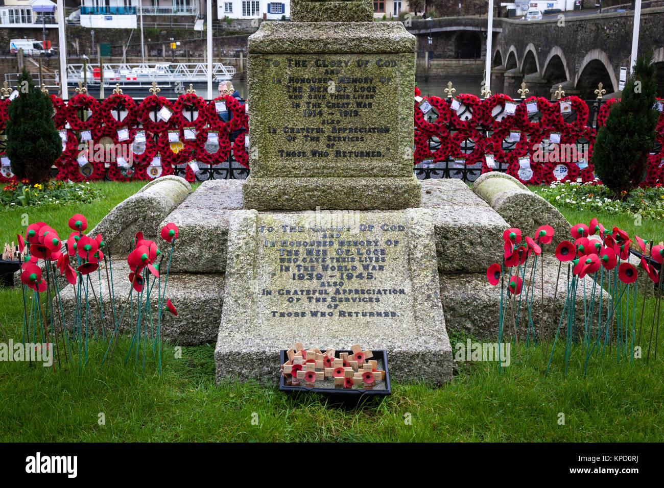 Poppies and poppy wreaths and crosses, feature alongside the War ...