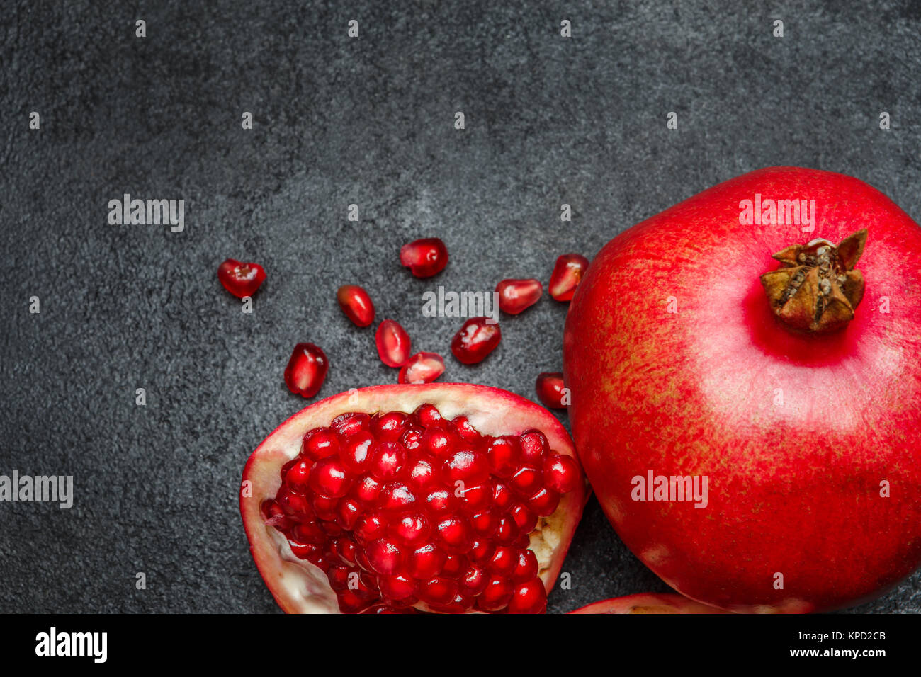 Pomegranate and seeds close-up Stock Photo - Alamy