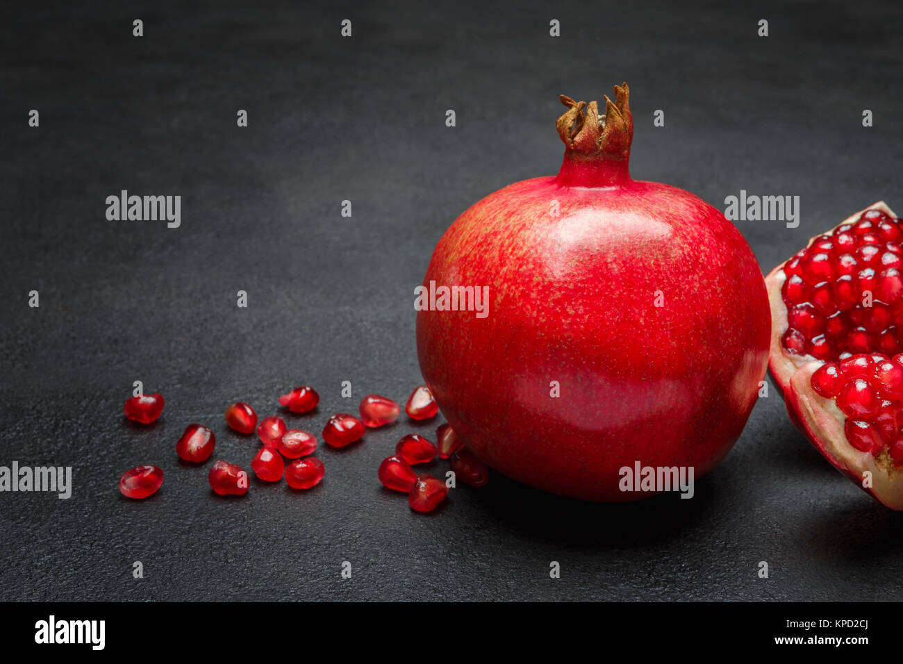 Pomegranate and seeds close-up Stock Photo - Alamy