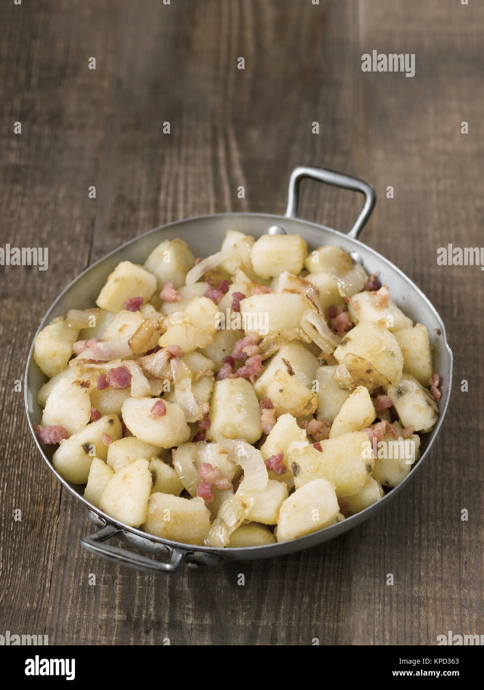 rustic german pan fried potato bratkartoffeln Stock Photo - Alamy