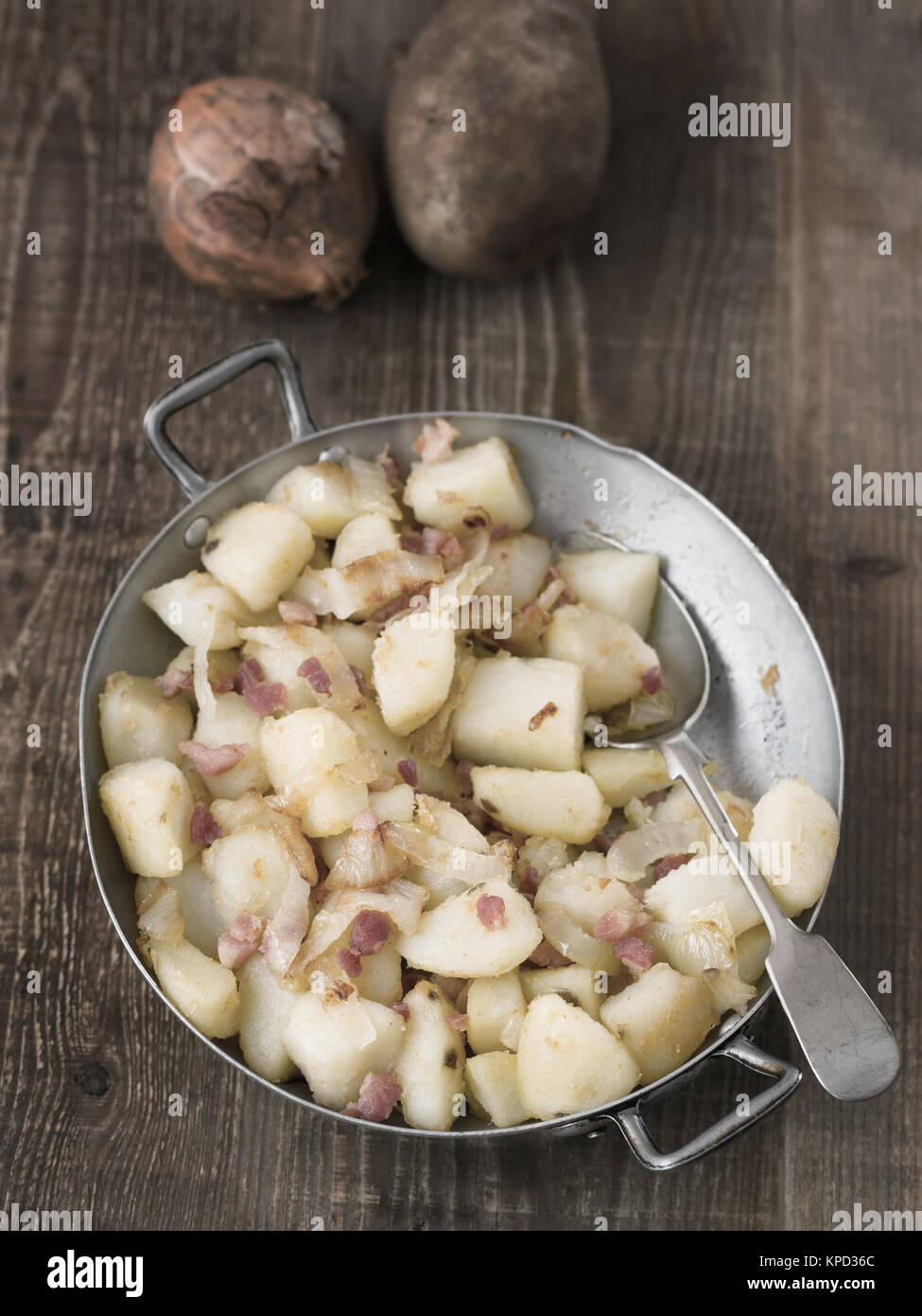 rustic german pan fried potato bratkartoffeln Stock Photo - Alamy