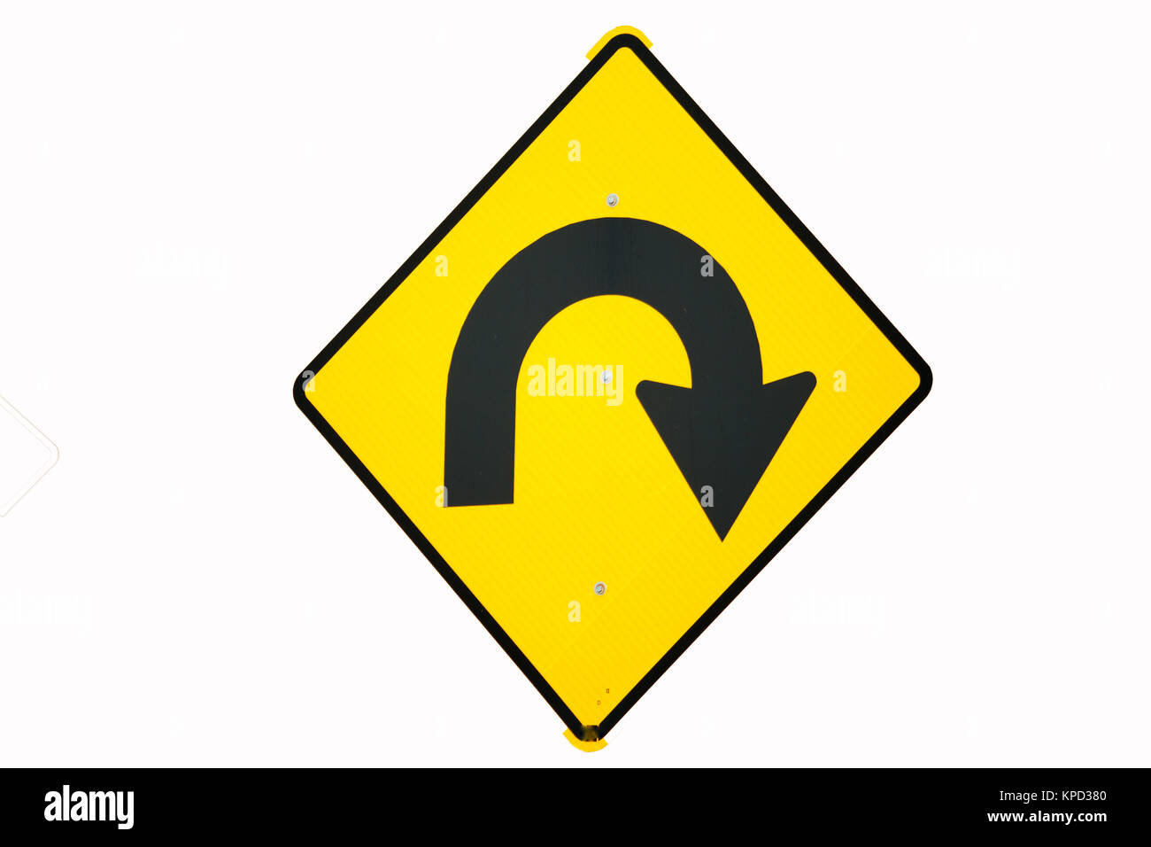 A yellow directional sign with black arrow directing to go right and ...
