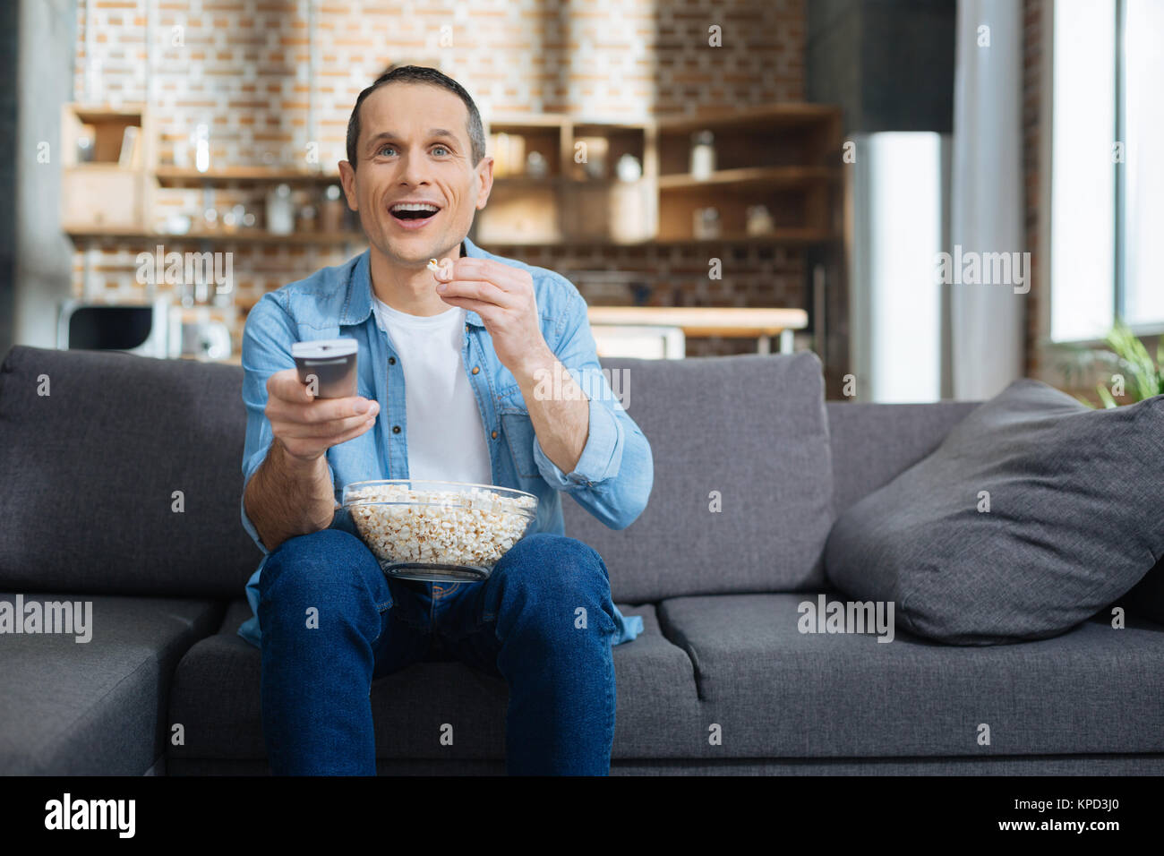 Surprised male person waiting for result Stock Photo - Alamy