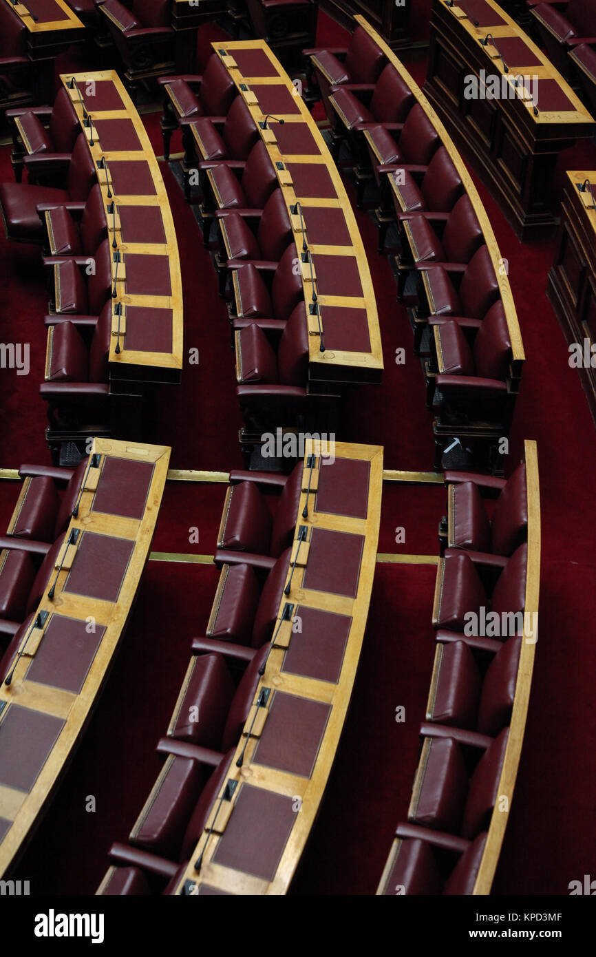 Rows of seats in the pleanary session of the Greek Parliament, in ...